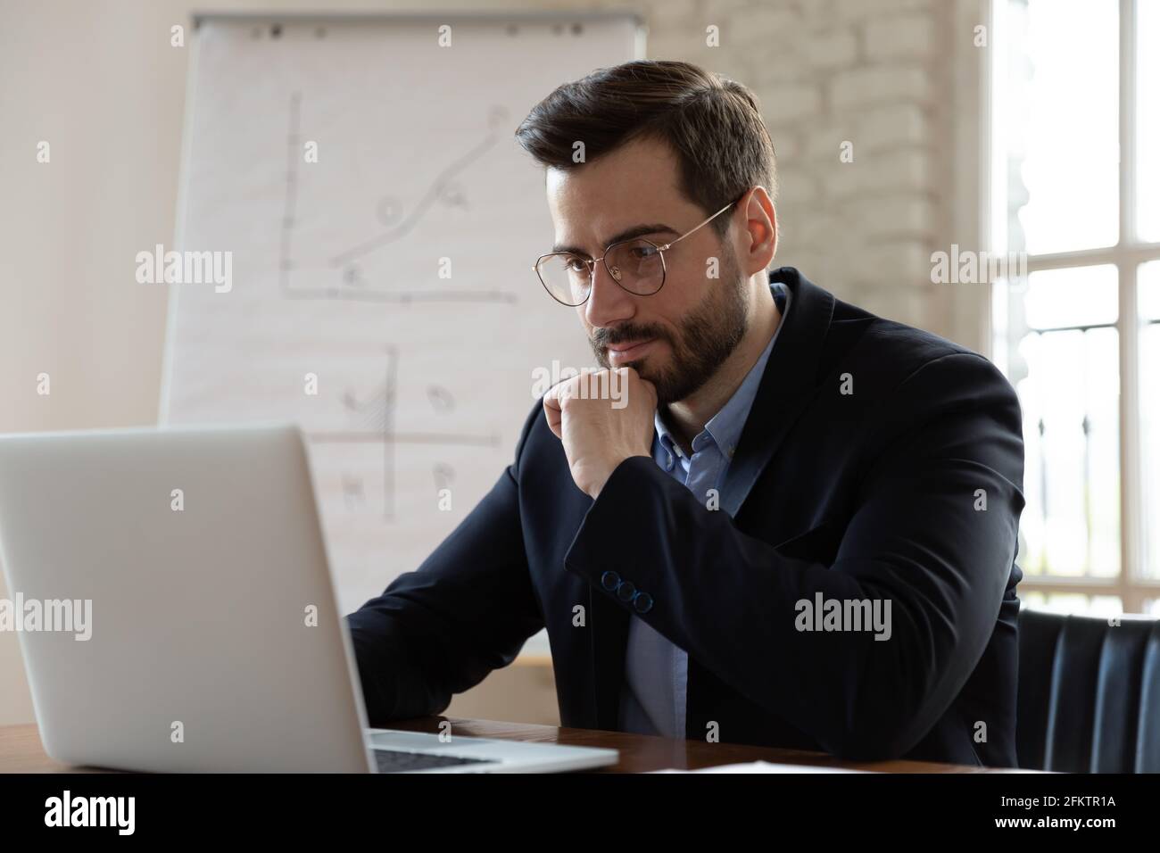 Male executive working on computer hi-res stock photography and images ...
