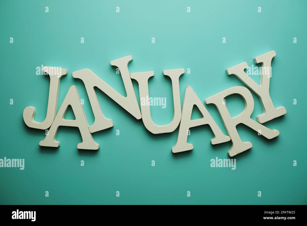 January alphabet letter on blue background Stock Photo - Alamy