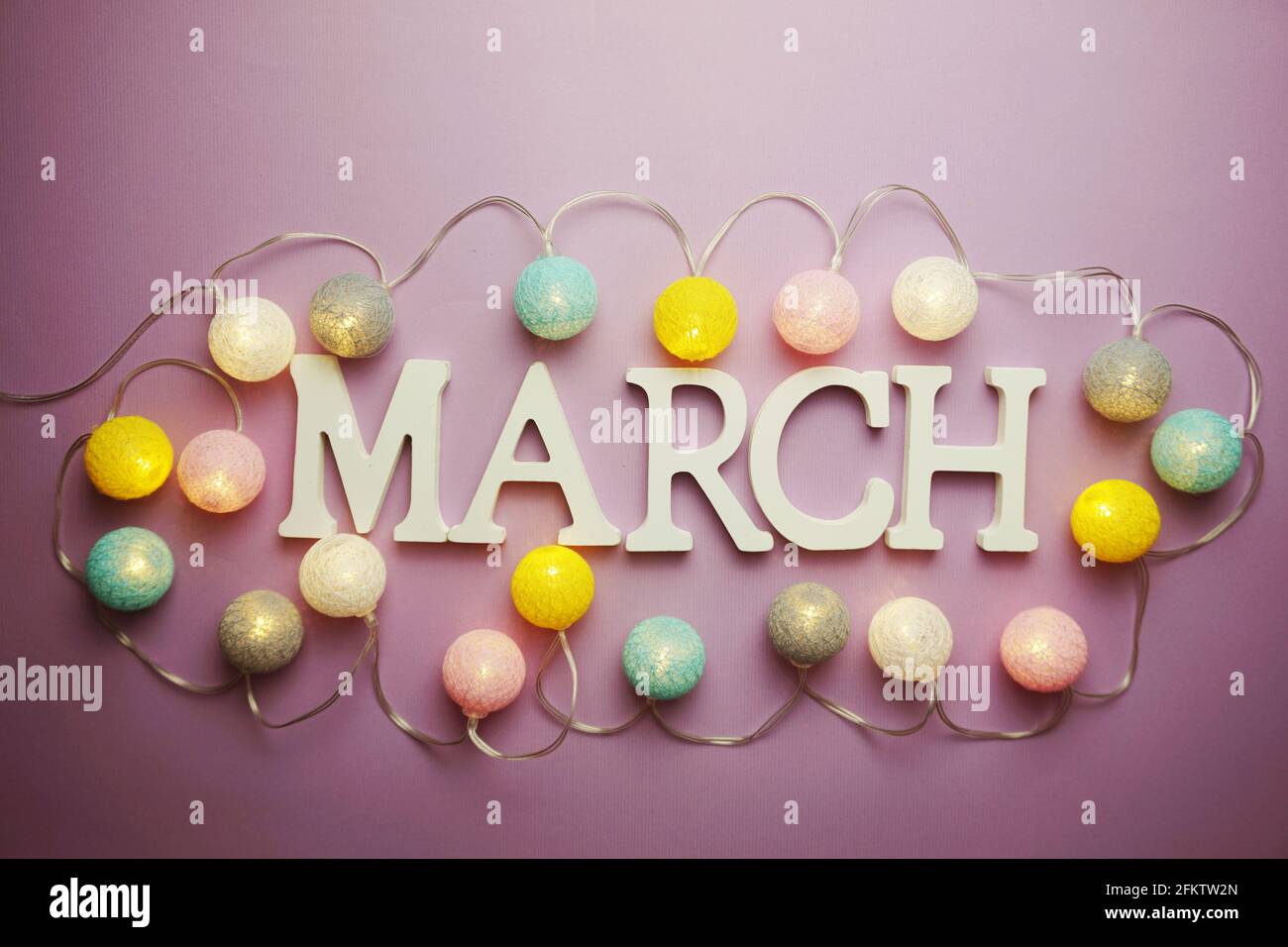 March alphabet letter with cotton ball LED decoration on purple ...