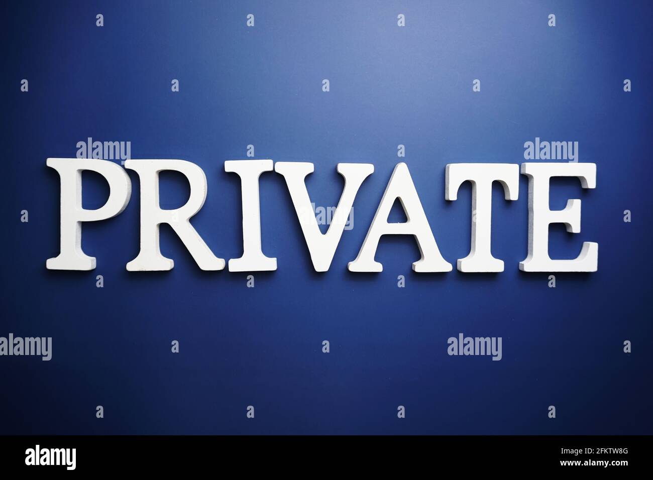 Private alphabet letter on blue background Stock Photo - Alamy