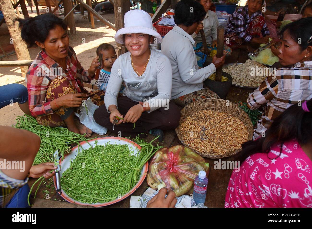 Woman prepare food for the monks at kampong Phulk, tonle sap lake, siem ...