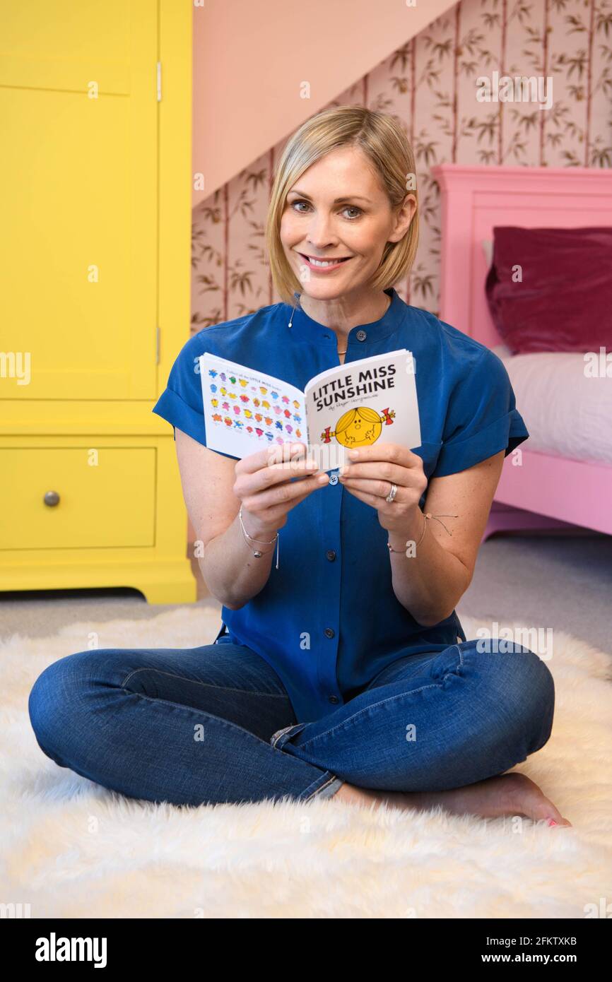 EDITORIAL USE ONLY Television and radio presenter, Jenni Falconer holds ...