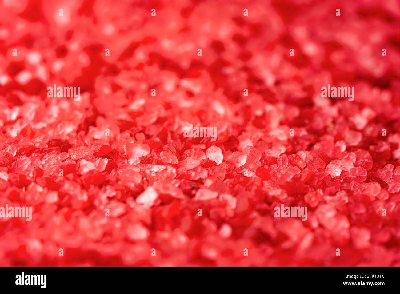 the background in the blur is red salt crystals. stone structure close ...