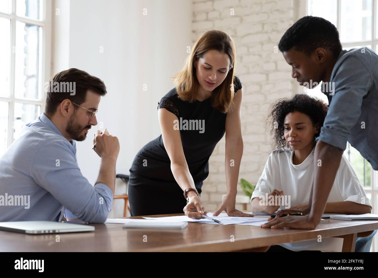 Project team leader working statistics hi-res stock photography and ...