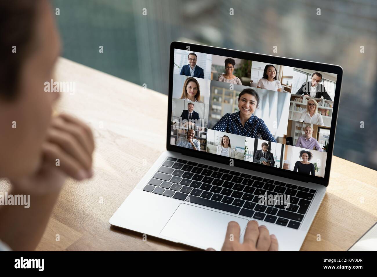 Multiethnic employees talk on video zoom call Stock Photo - Alamy