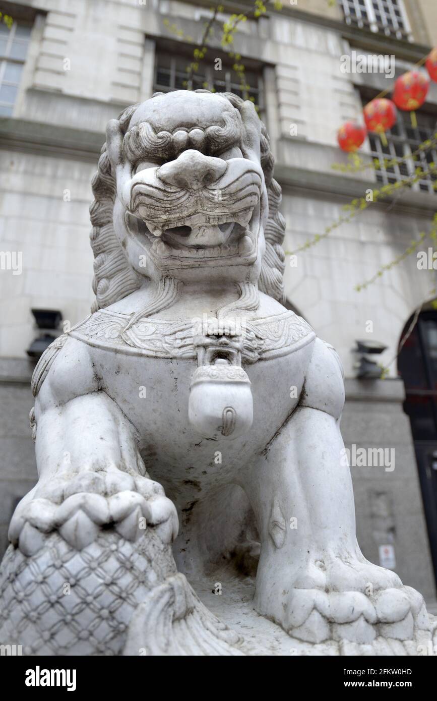 London, England, UK. Chinatown: stone Chinese dragon in Gerrard Street ...