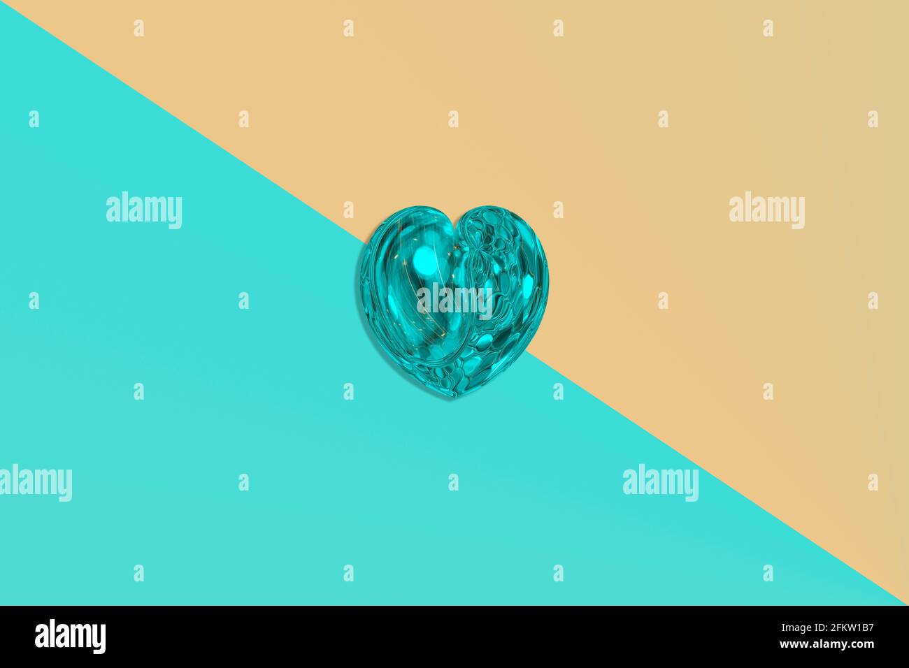 green crystal heart on a two-tone background Stock Photo - Alamy