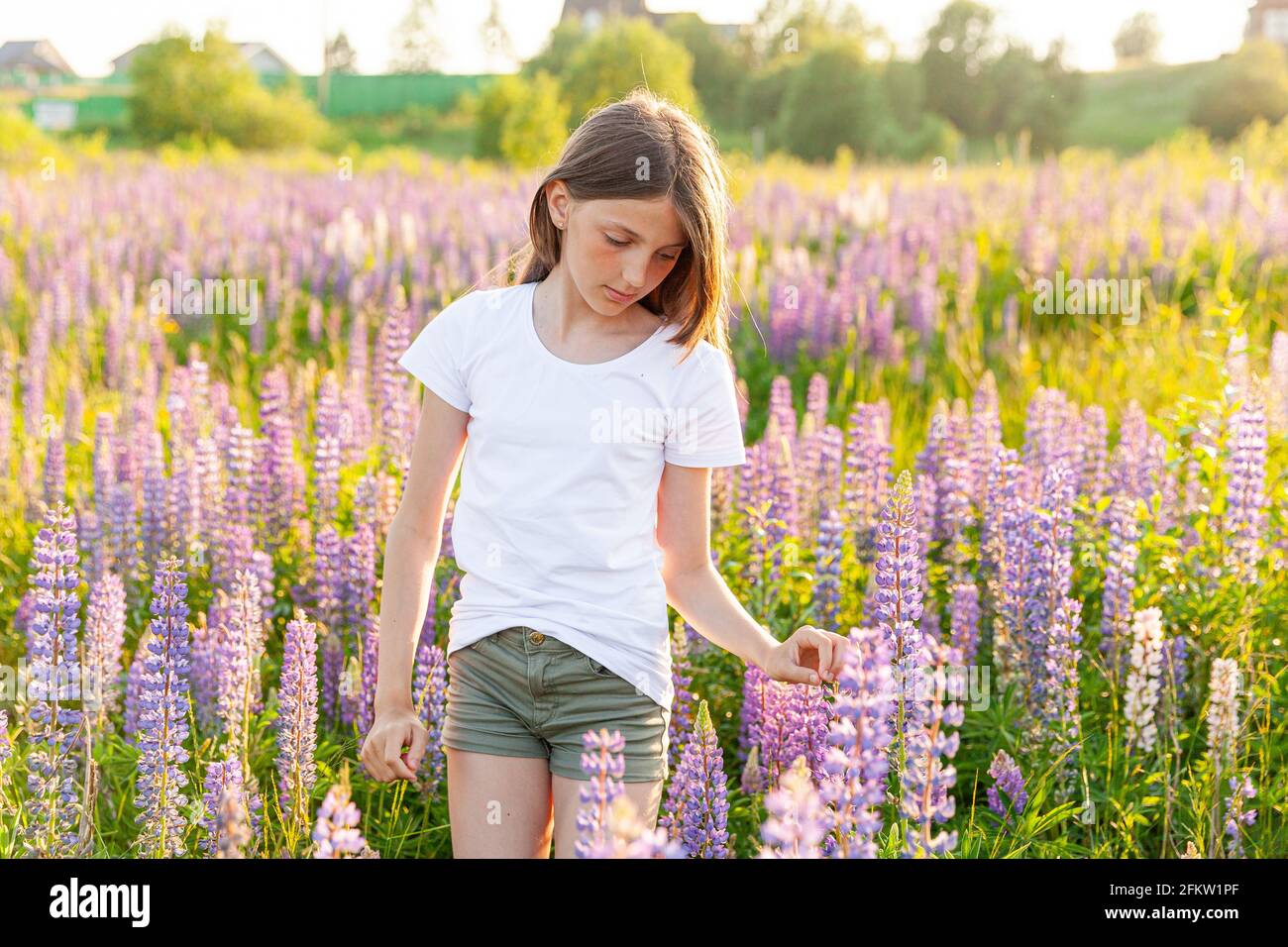 Happy teenage girl smiling outdoor. Beautiful young teen woman resting ...