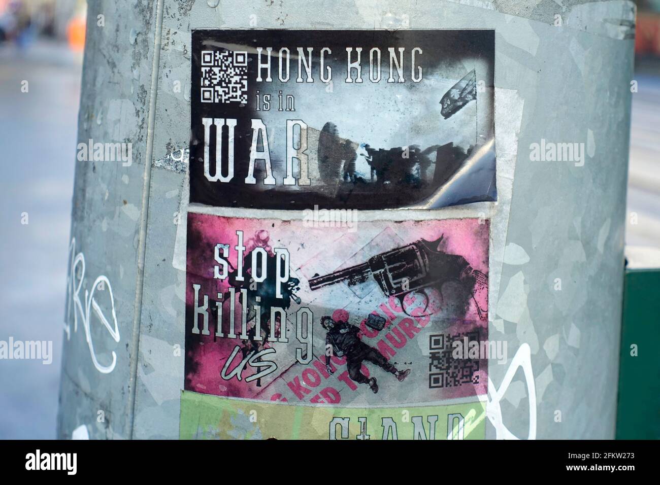 Sticker against violence against activists in Hong Kong Stock Photo - Alamy
