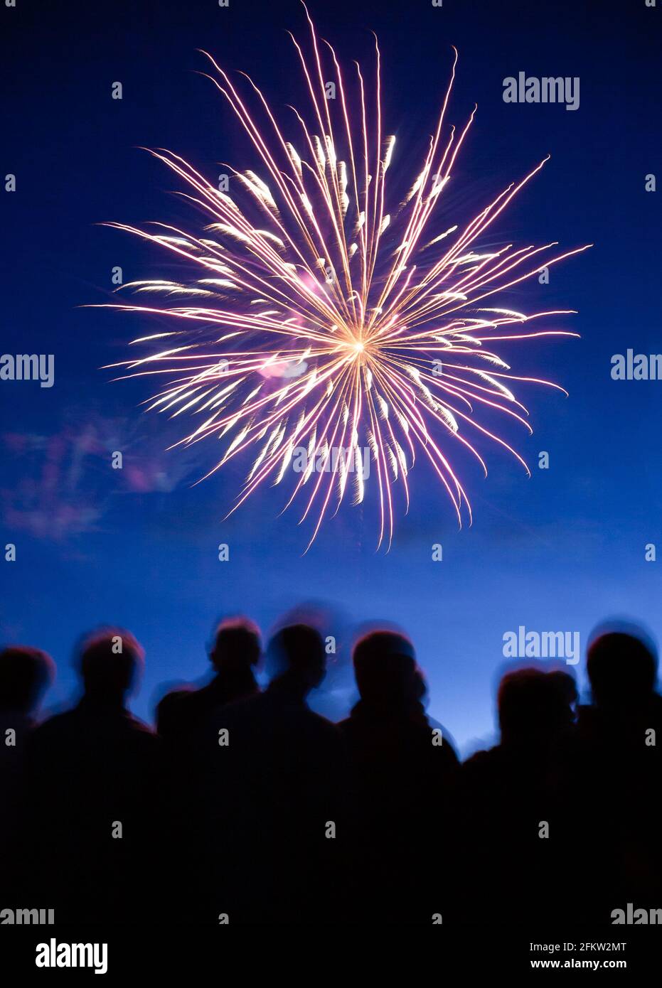 Crowd watching fireworks and celebrating Stock Photo - Alamy