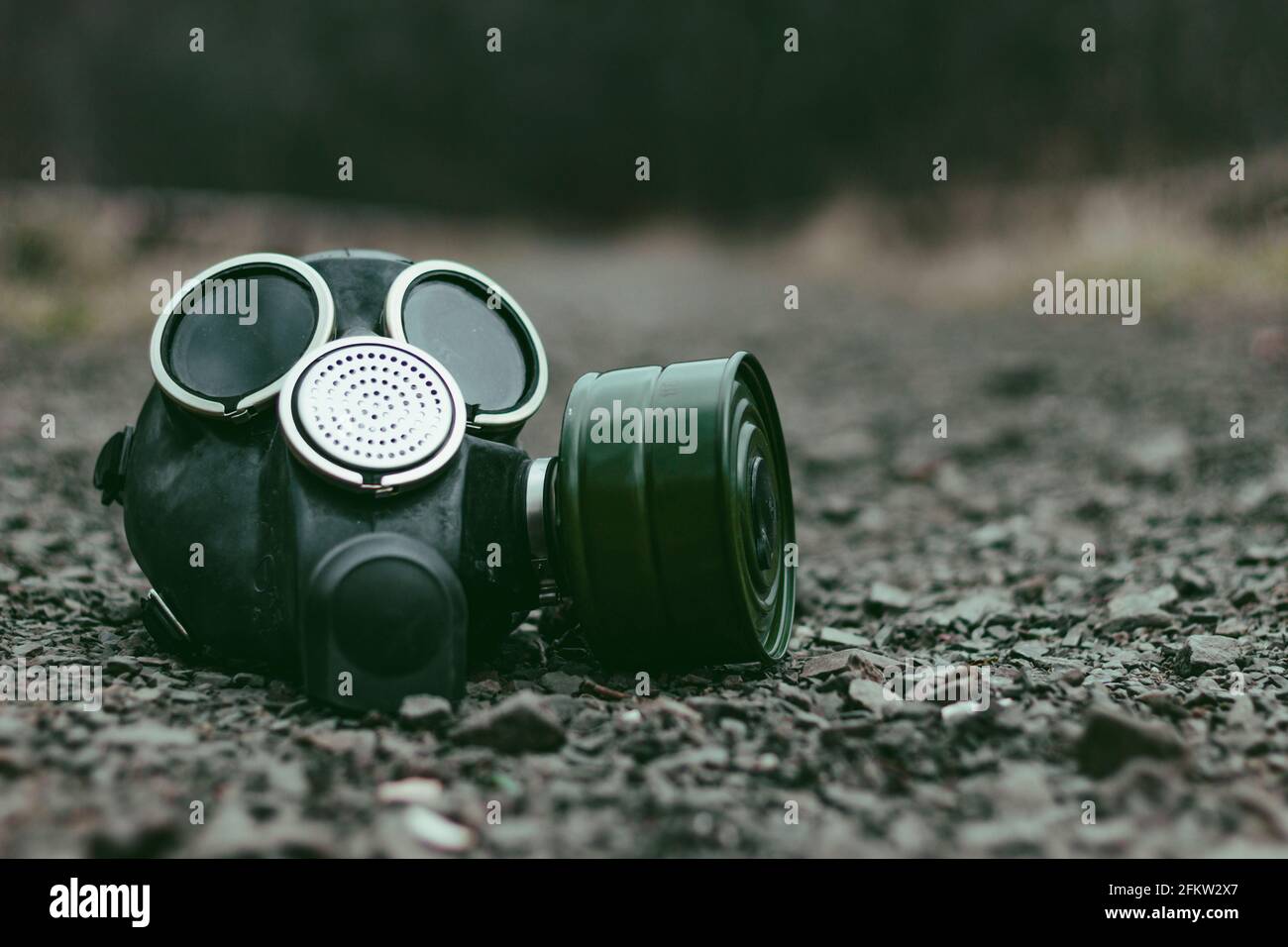 Closeup of the old gas mask lying at the ground Stock Photo - Alamy