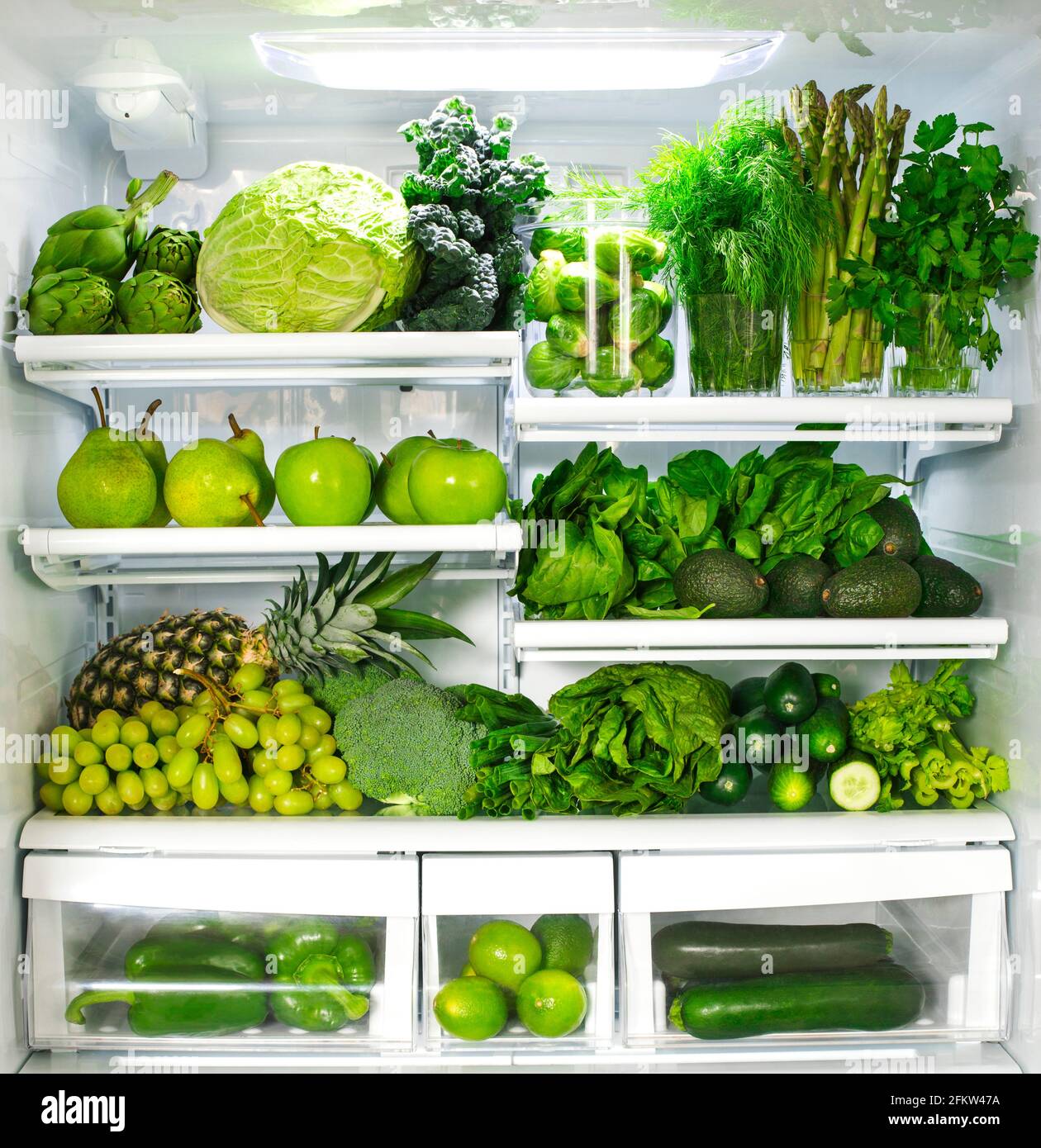 Fresh green vegetables and fruits in fridge Stock Photo - Alamy