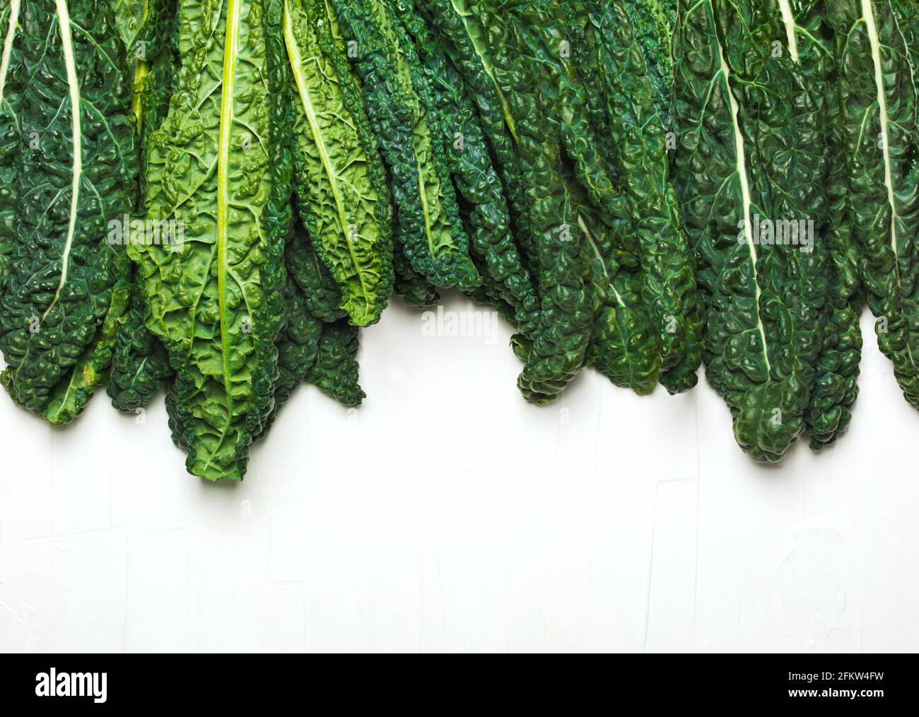 Fresh Green Kale on white background Stock Photo - Alamy