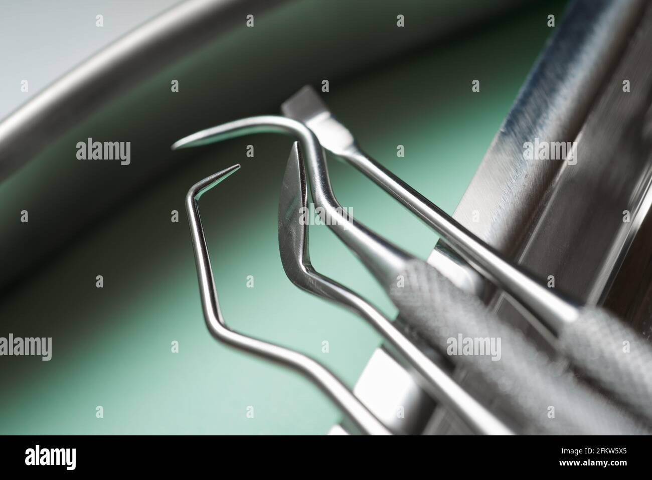 Instruments used by the dentist on a metal tray Stock Photo - Alamy