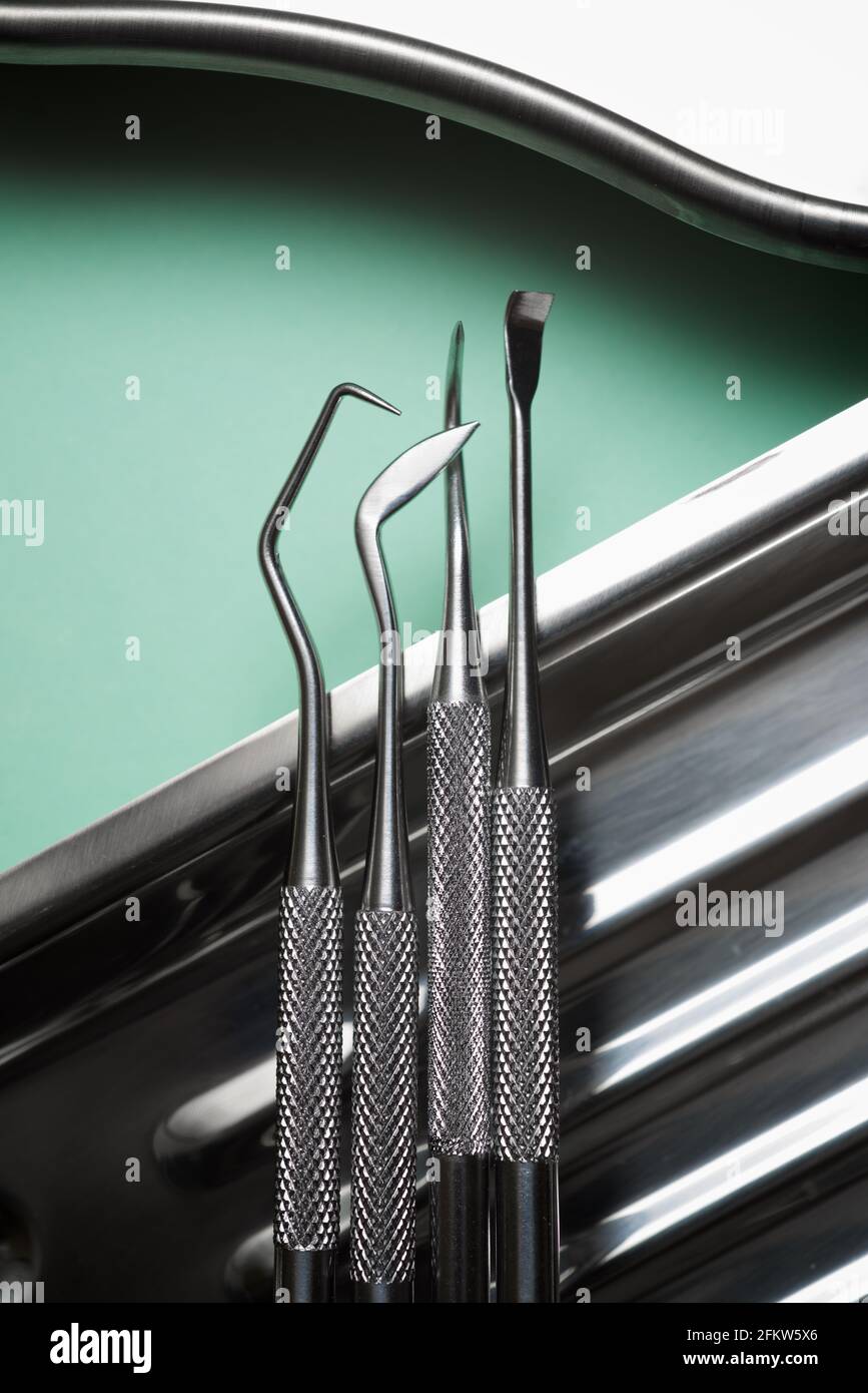 Instruments used by the dentist on a metal tray Stock Photo - Alamy