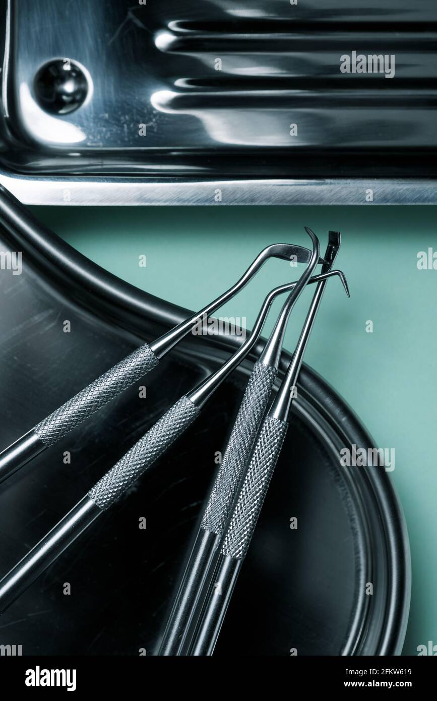 Instruments used by the dentist on a metal tray Stock Photo - Alamy