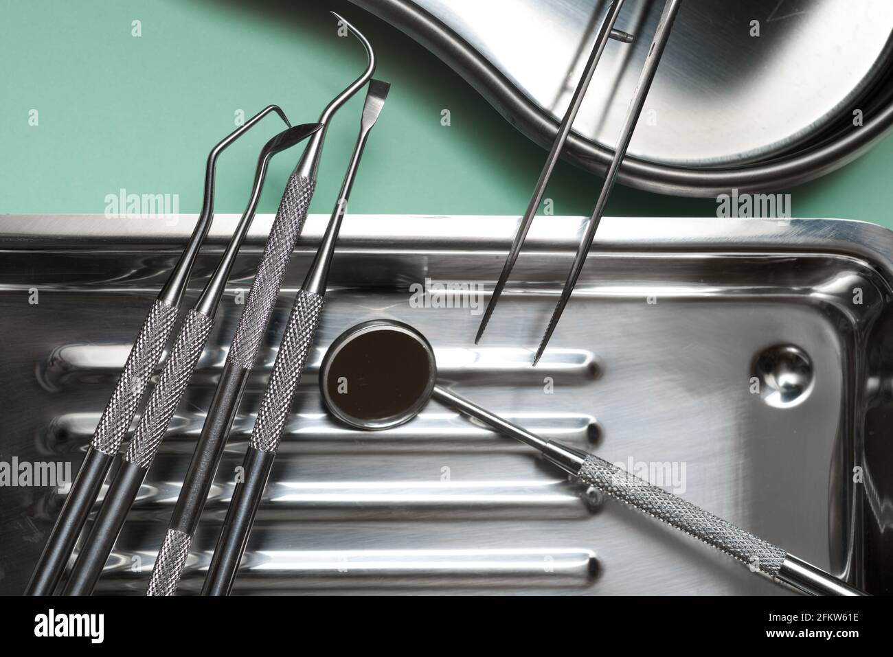 Instruments used by the dentist on a metal tray Stock Photo - Alamy