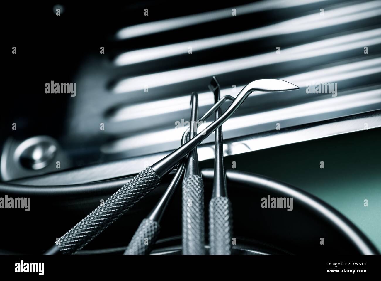 Instruments used by the dentist on a metal tray Stock Photo - Alamy
