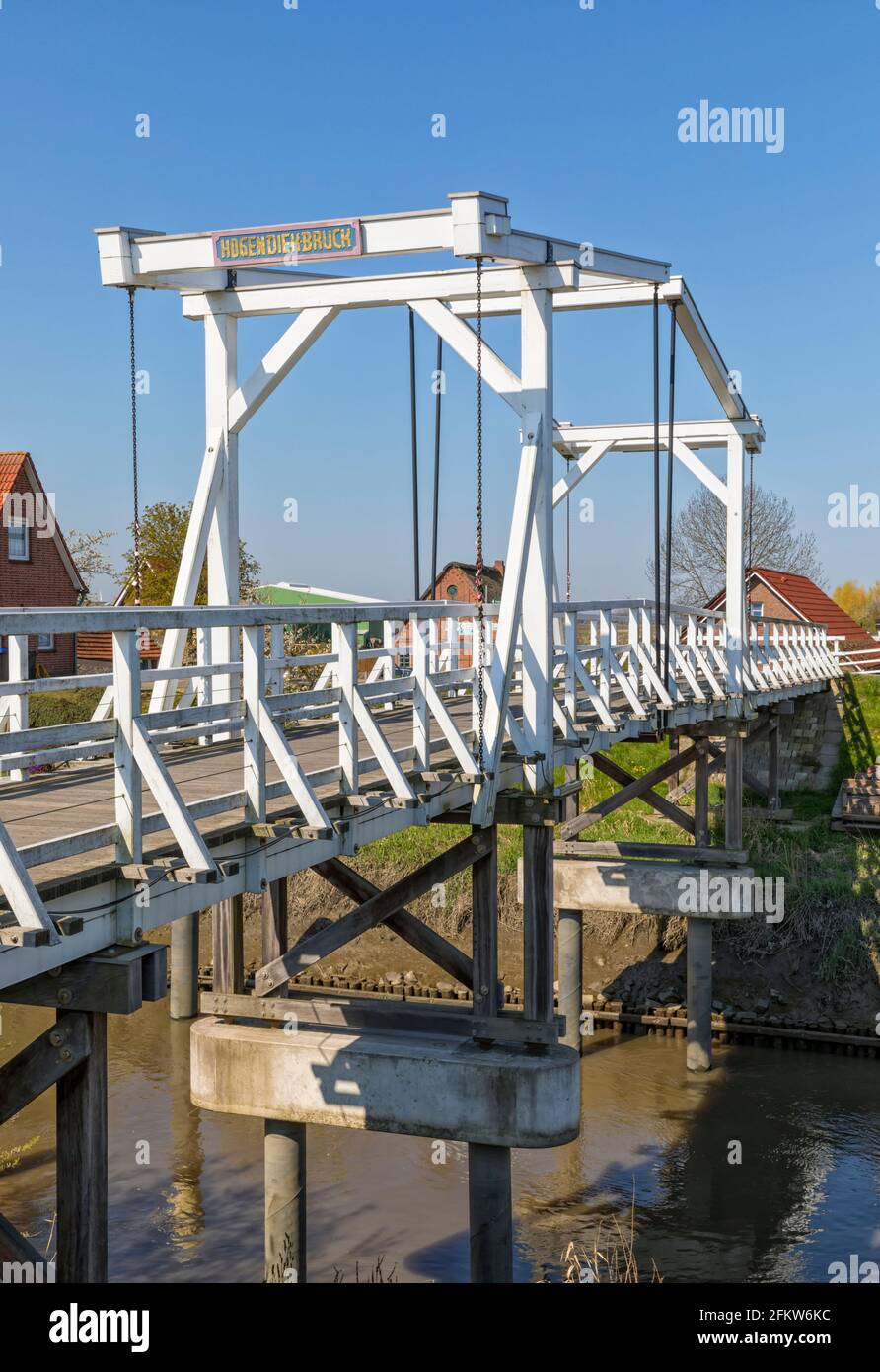 Wooden dutch drawbridge across Lühe river at Altes Land region of Lower ...
