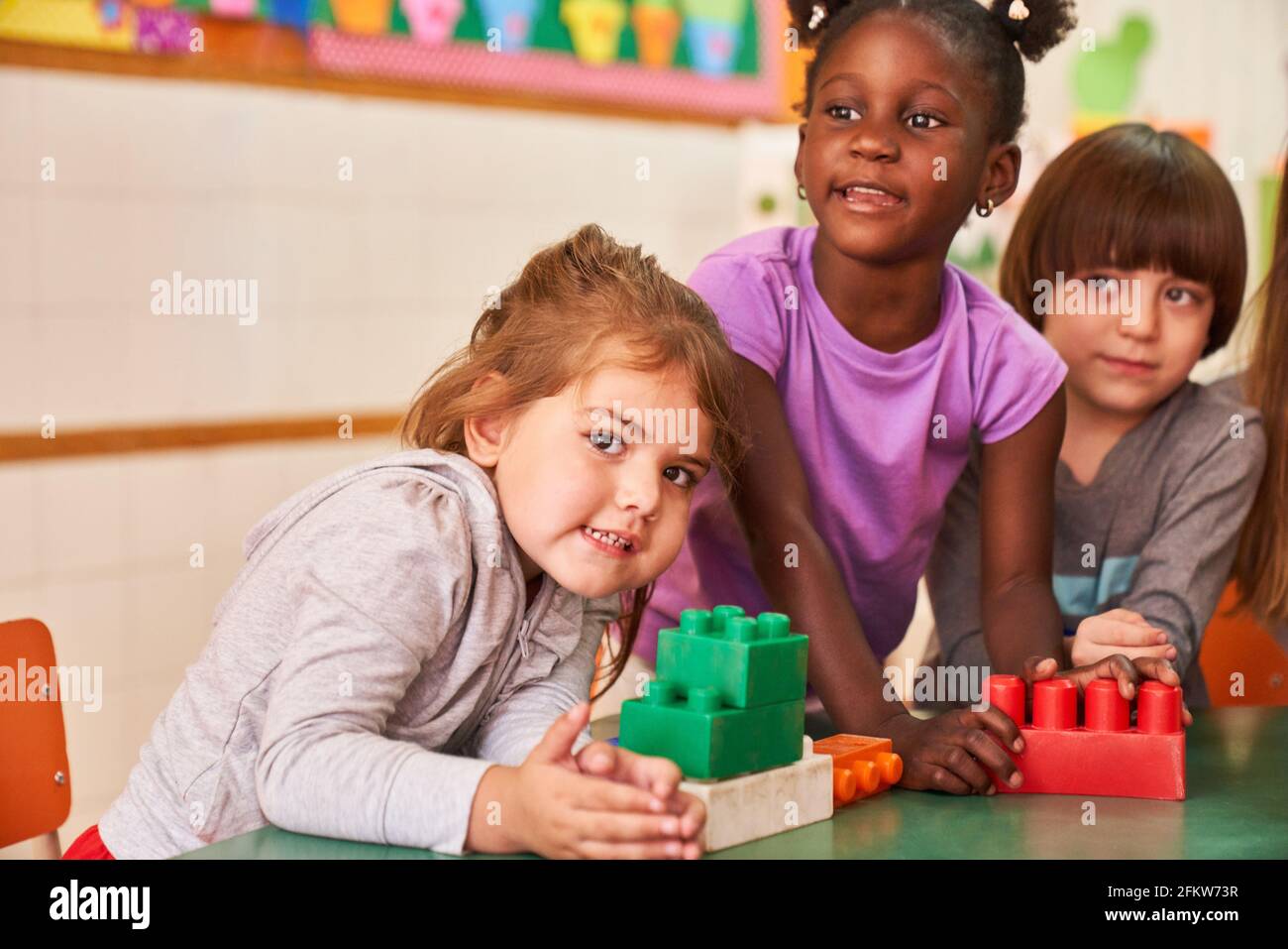 Group of multicultural children as friends in an international ...