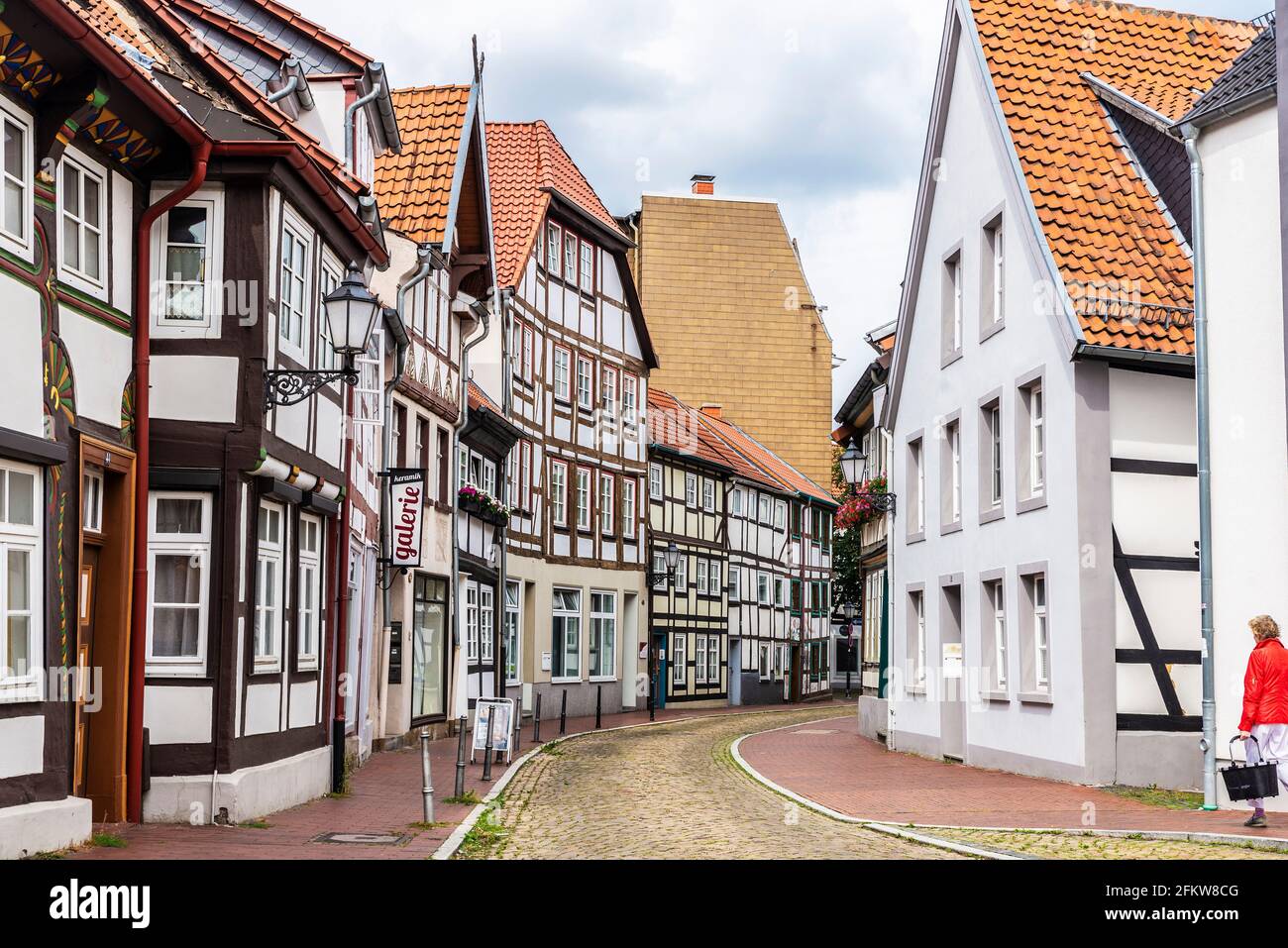 Hamelin, Germany - August 20, 2019: Street with medieval houses with a ...