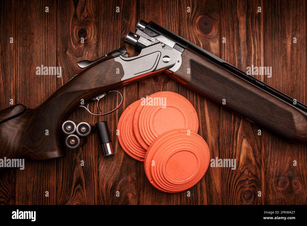 Clay target plates for shooting with rifle on wooden background Stock ...