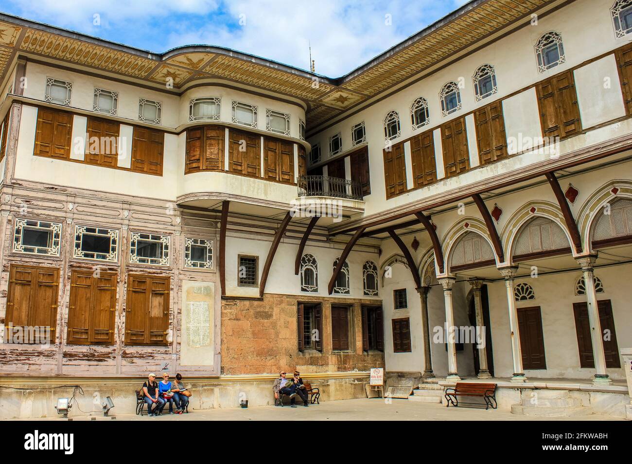 Istanbul, Turkey - May 13, 2013: People Sitting on the Benches in front ...
