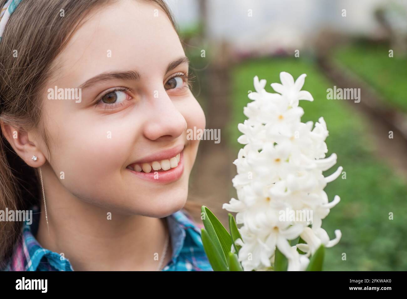 smooth skin. flowers in garden. daily chores. flower care. horticulture ...