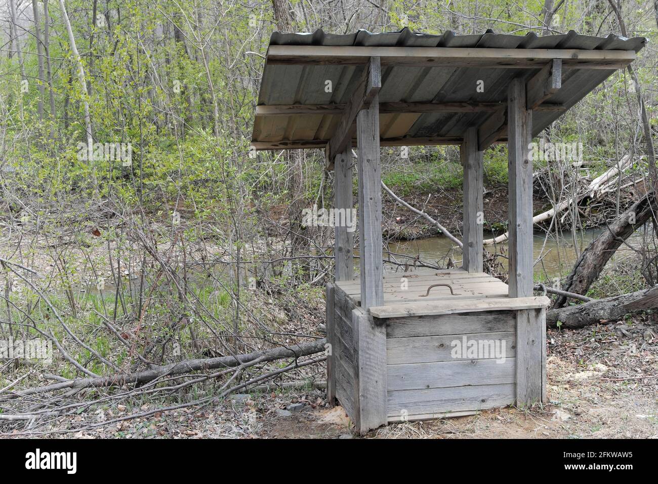 Spring with wooden well hi-res stock photography and images - Alamy