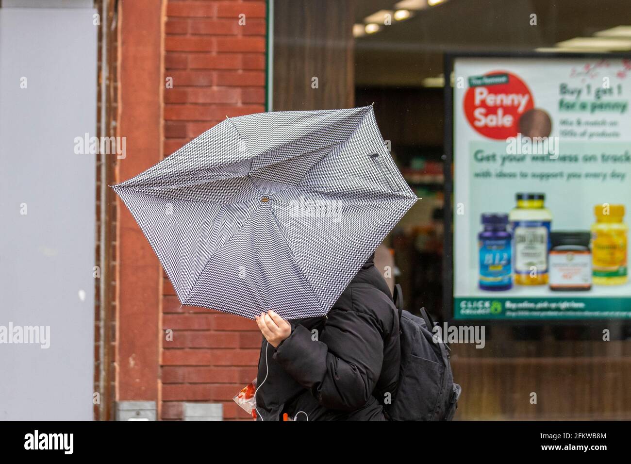 Wet and windy day in preston city centre hi-res stock photography and ...