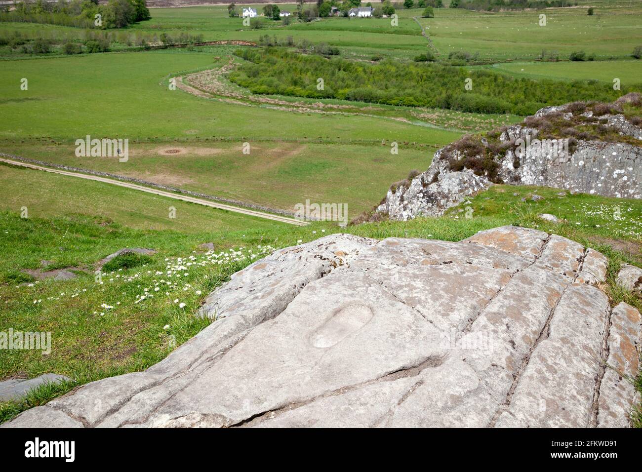 Footprint carved into the rock at the ancient hillfort of Dunadd ...