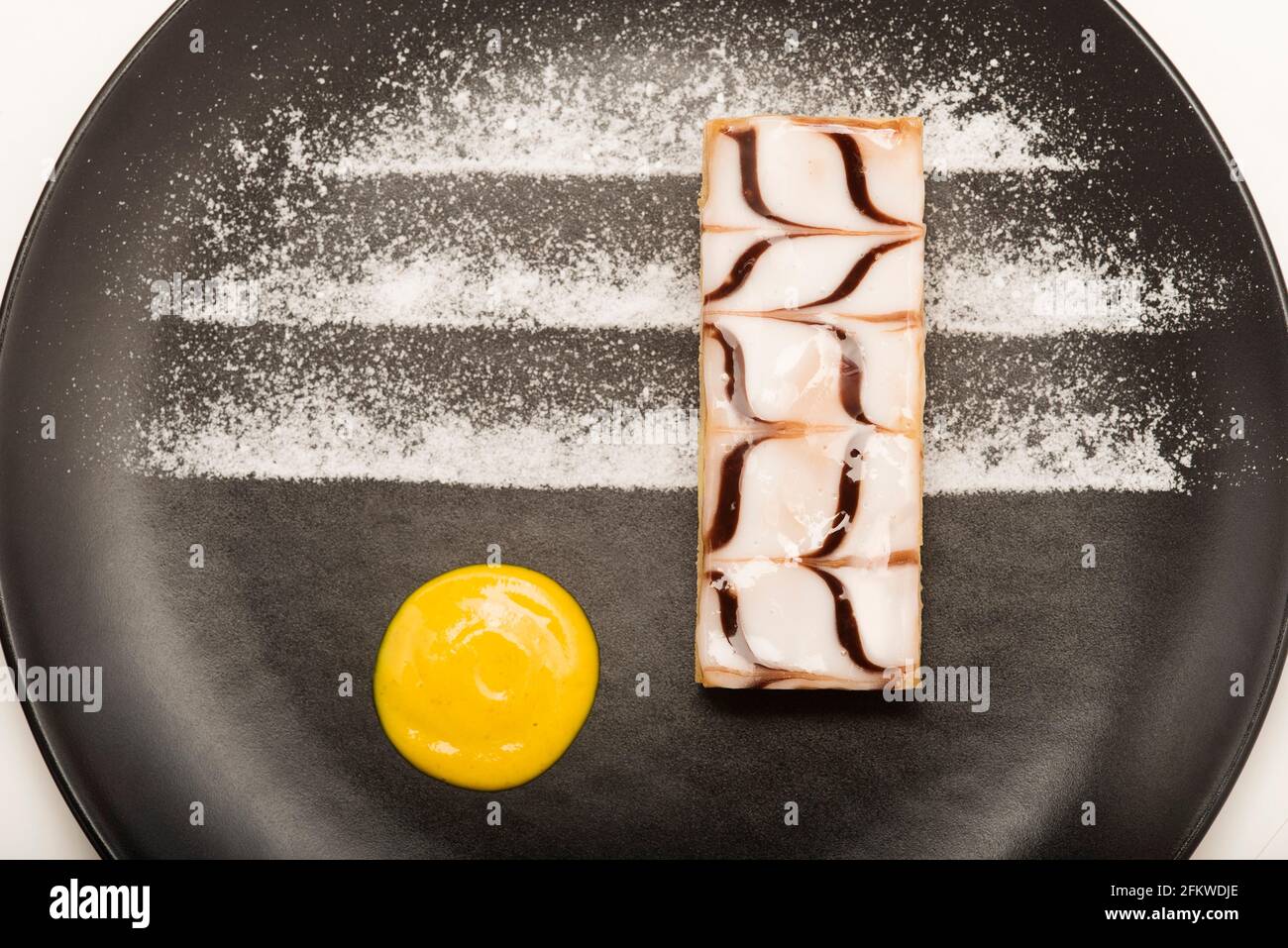Nouvelle cuisine style presentation of a Millefeuille pastry aka ...