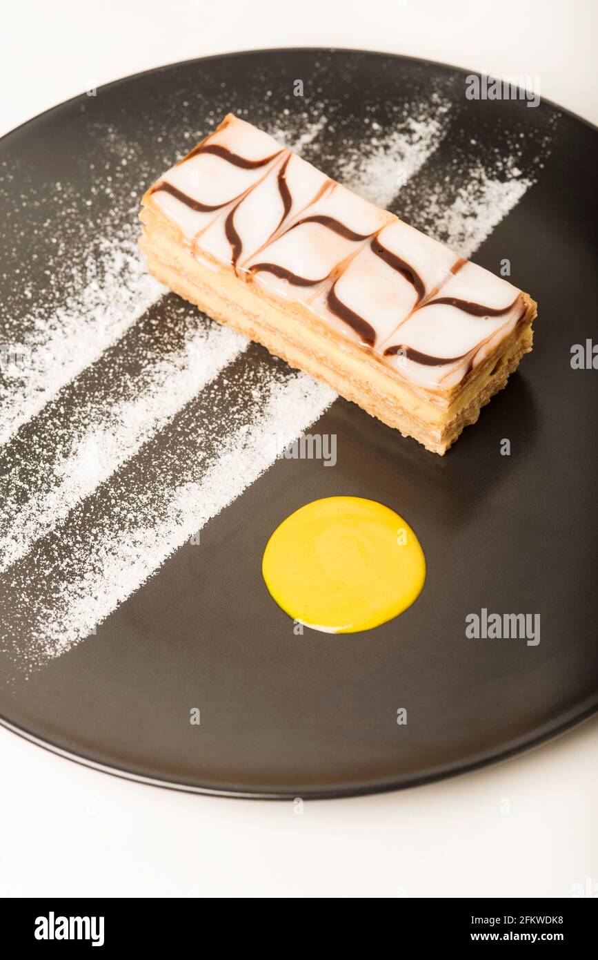 Nouvelle cuisine style presentation of a Millefeuille pastry aka ...
