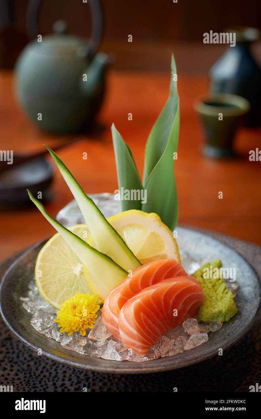 salmon sushi with lemon and herbs Stock Photo - Alamy