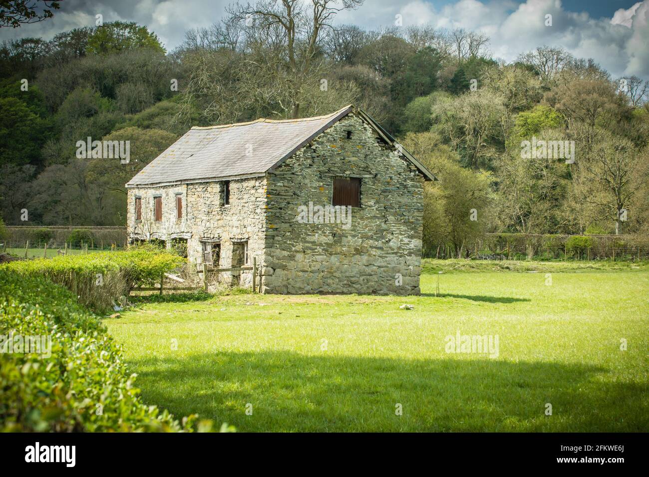 A dilapidated stone built barn on a farm in North Wales Stock Photo - Alamy