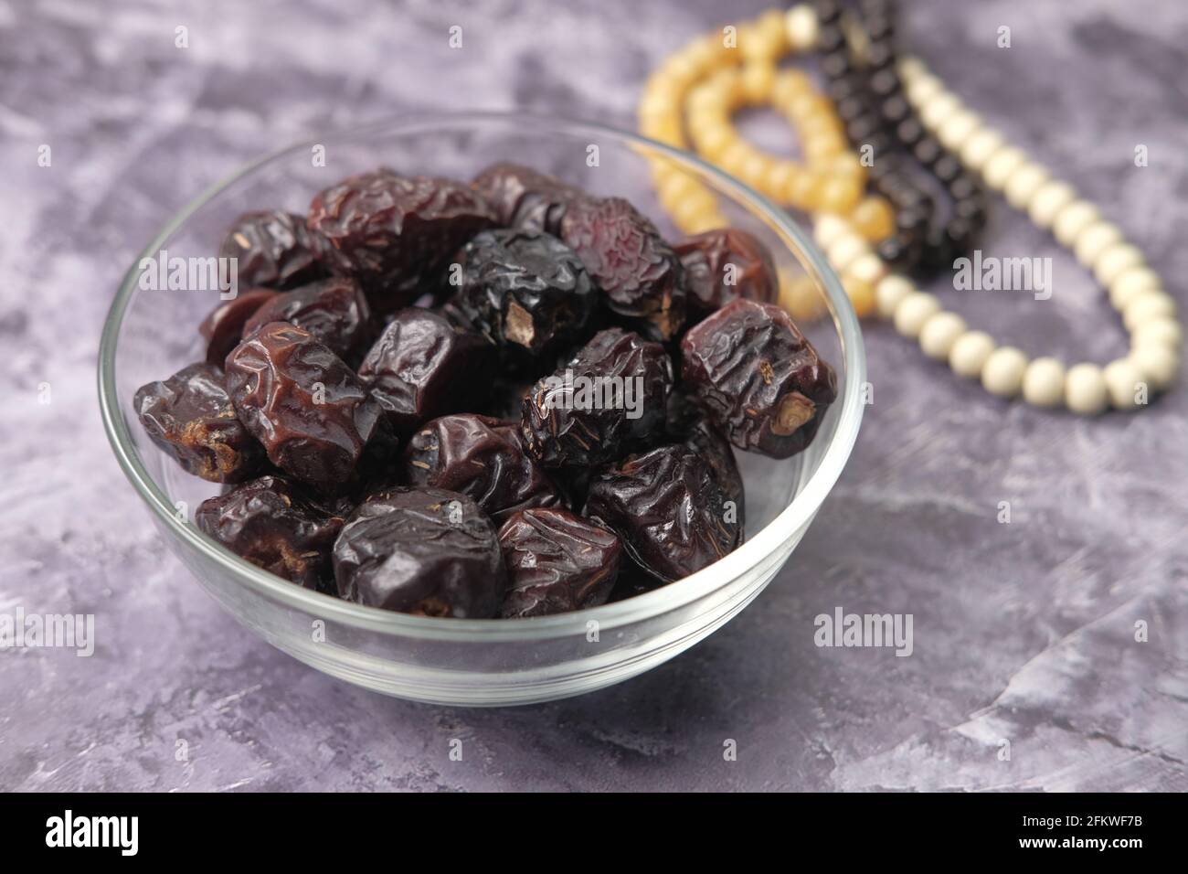close up of fresh date fruit in a bowl on table Stock Photo - Alamy