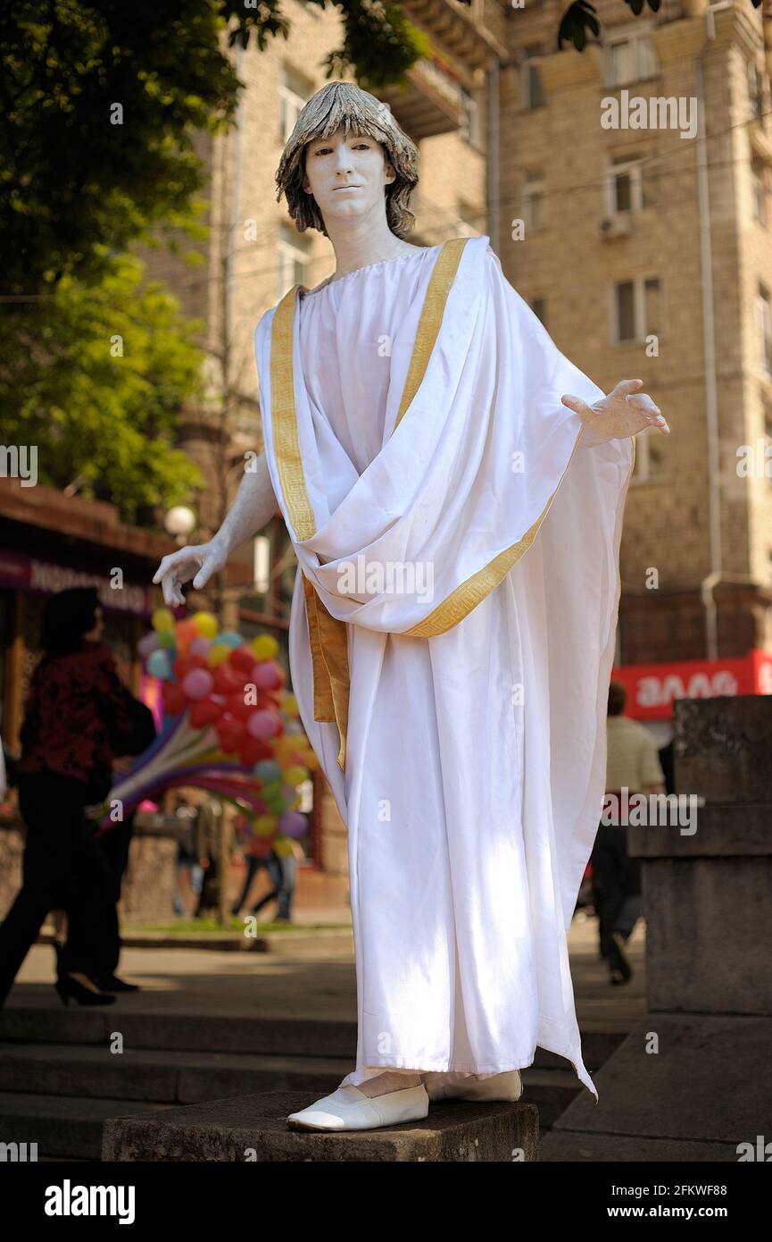 Street actor posing on the square of the city Stock Photo - Alamy