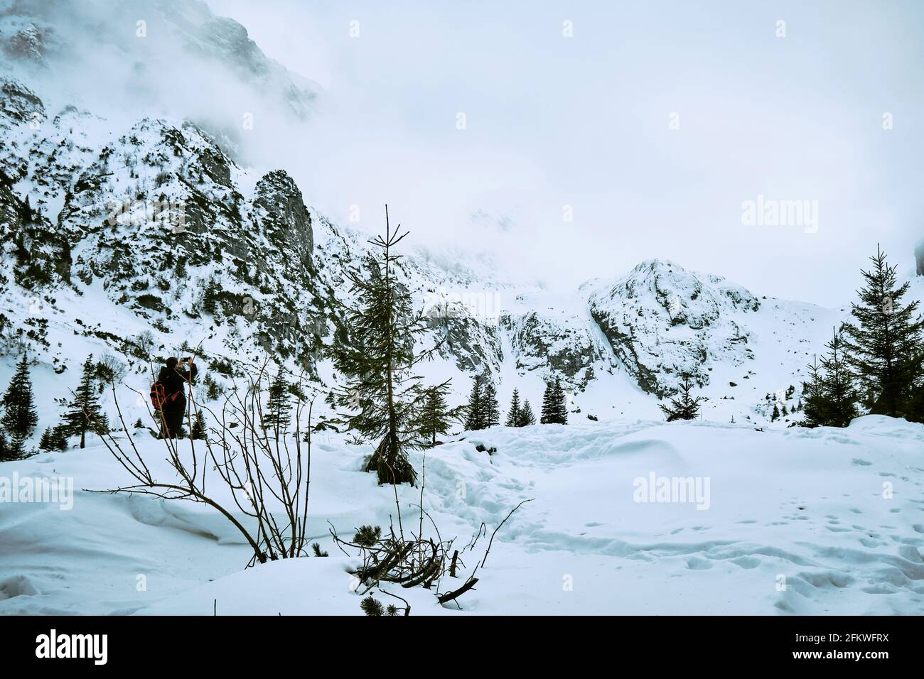 A spectacular mountain landscape with a lot of snow Stock Photo - Alamy