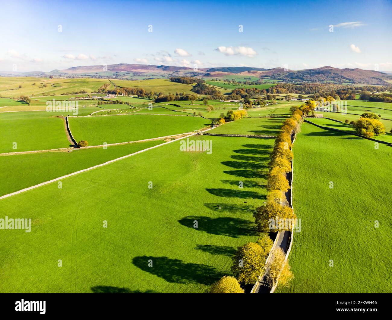 Aerial view of endless lush pastures and farmlands of England ...