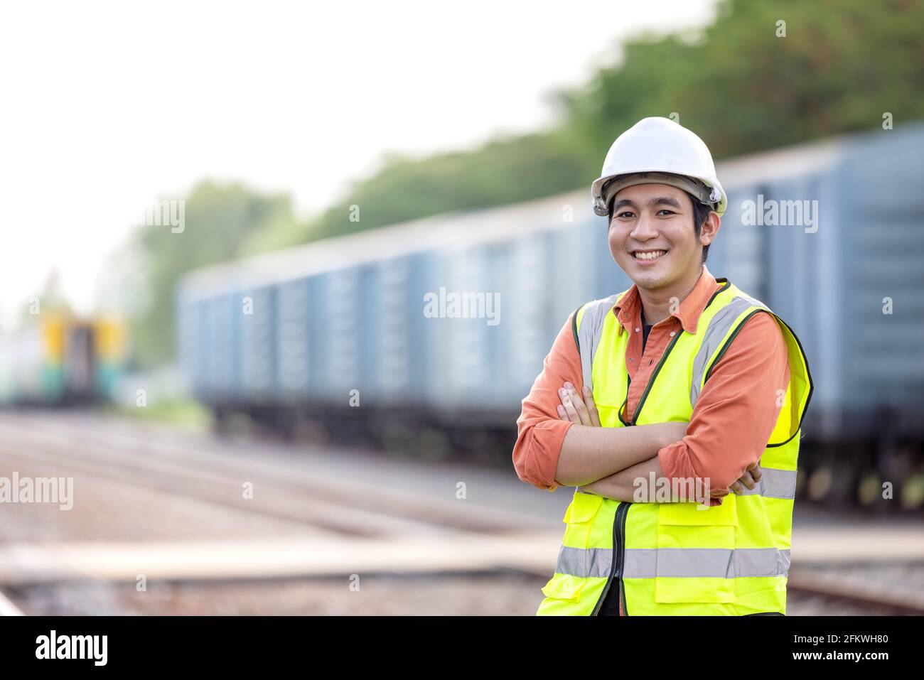 Portrait Engineer man working on railway. Chief Engineer in the Hard ...