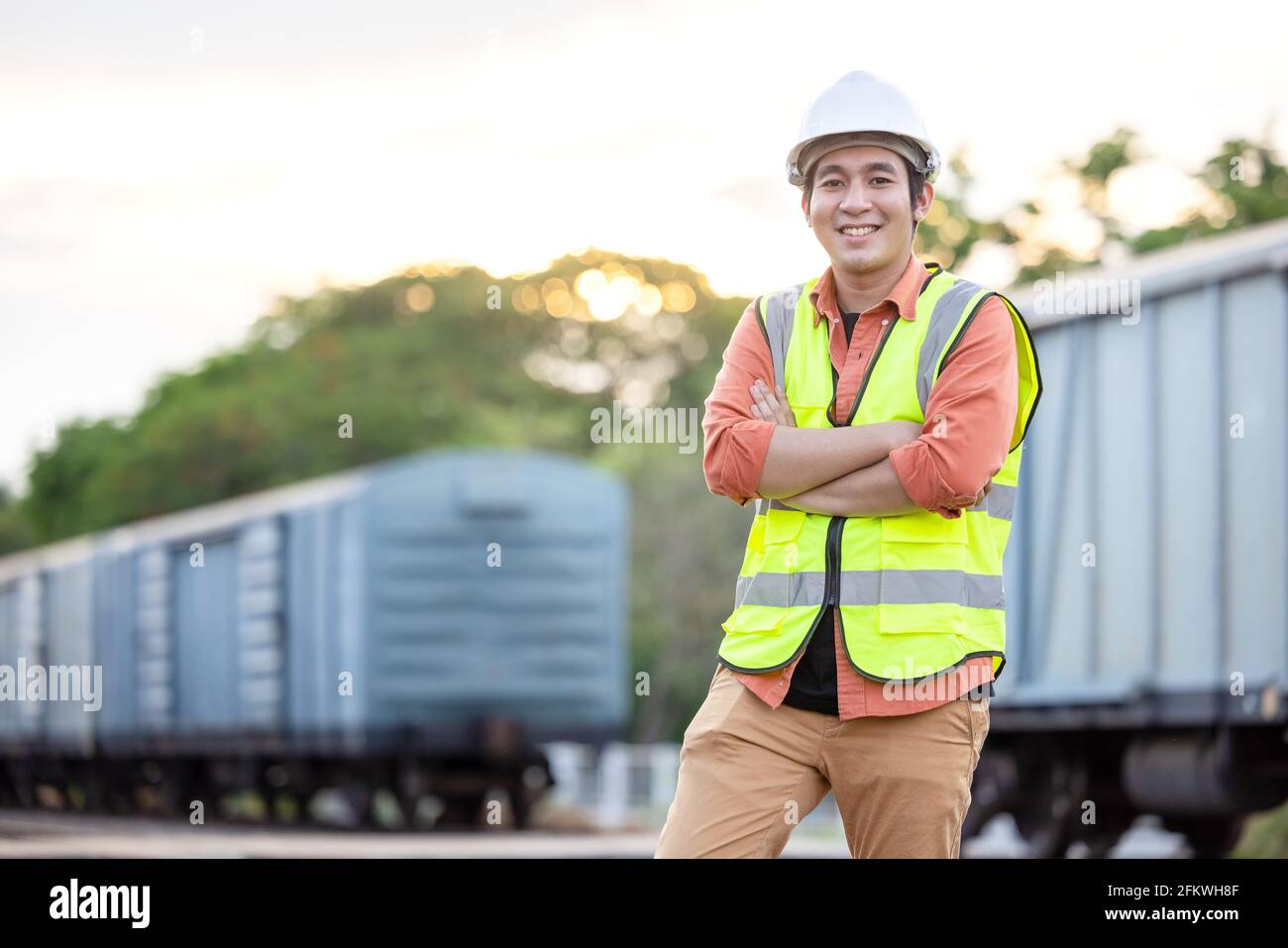 Portrait Engineer man working on railway. Chief Engineer in the Hard ...