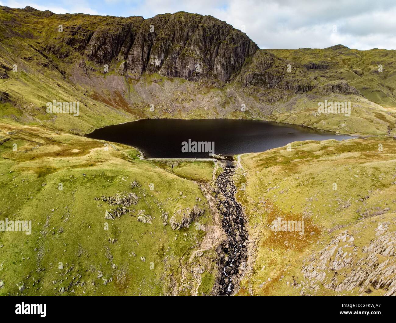 Aerial view of Stickle Tarn lake, located in the Lake District, Cumbria ...
