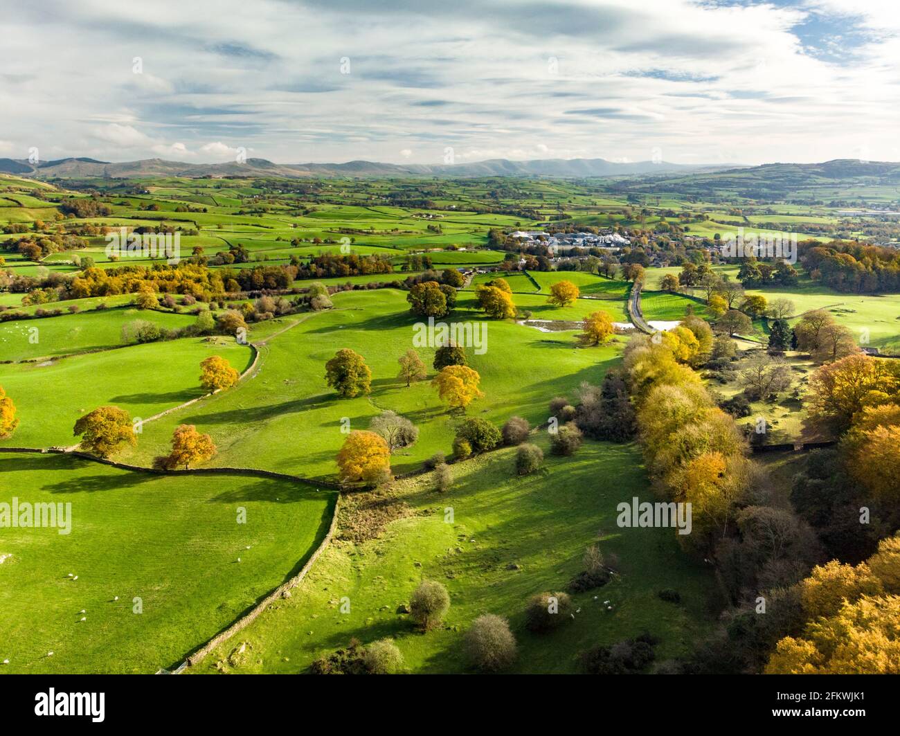 Aerial view of endless lush pastures and farmlands of England ...