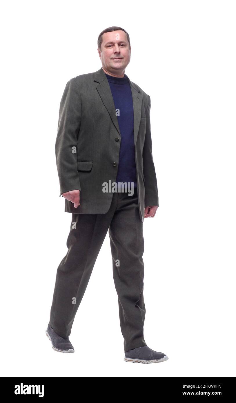 in full growth. confident mature man stepping forward Stock Photo - Alamy
