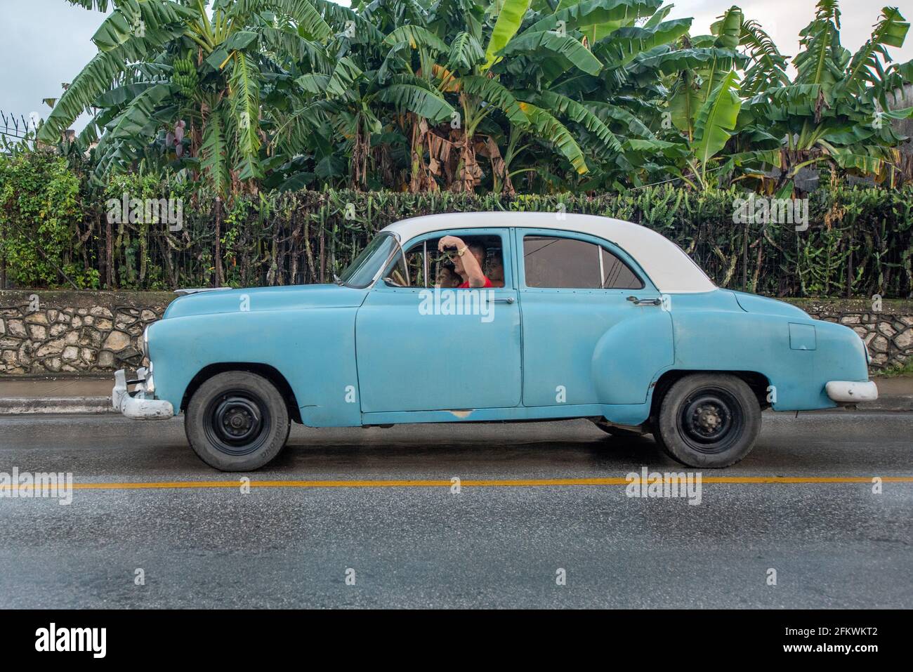 Cuban vintage American cars driving, Cuba transportation scene in the ...