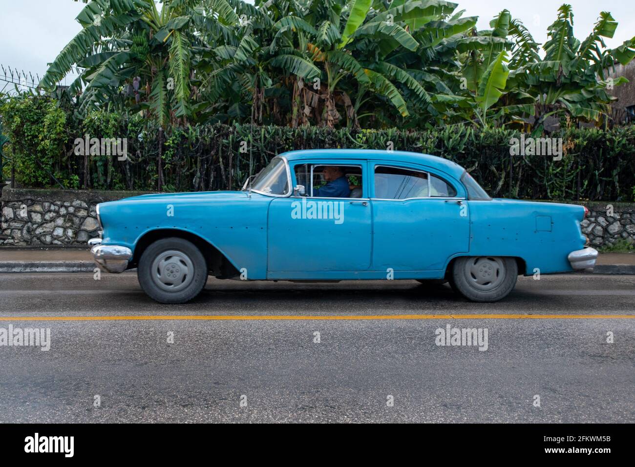 Cuban vintage American cars driving, Cuba transportation scene in the ...