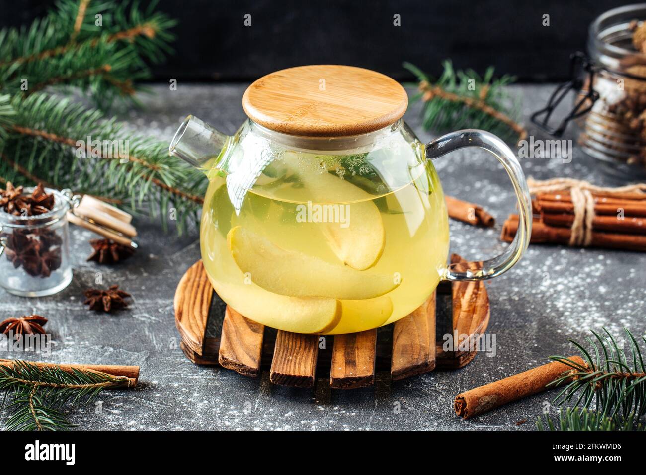 Glass kettle of fresh pear herbal tea Stock Photo - Alamy