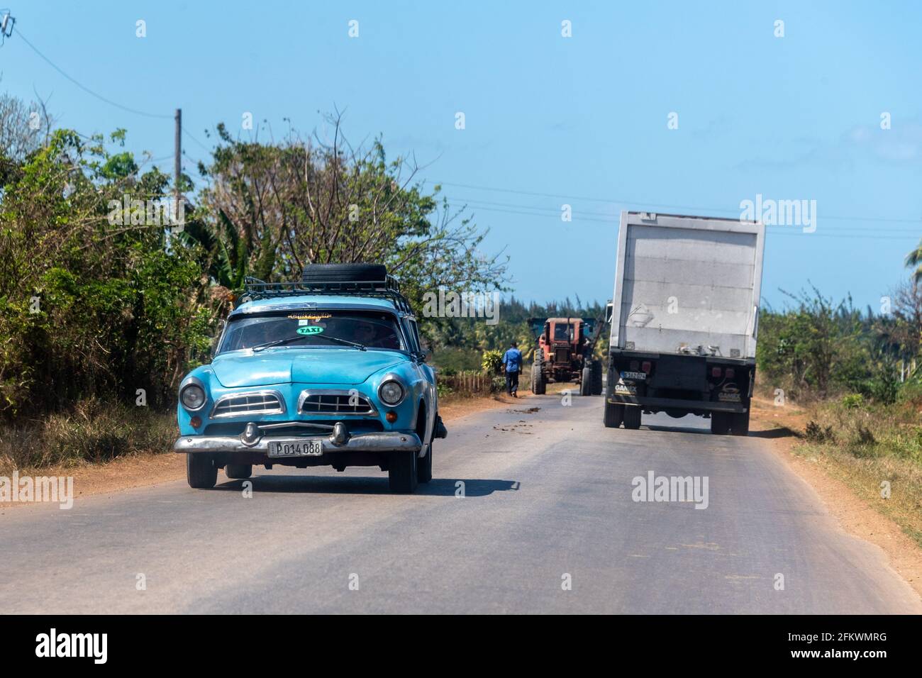 Cuban vintage American cars driving, Cuba transportation scene in the ...