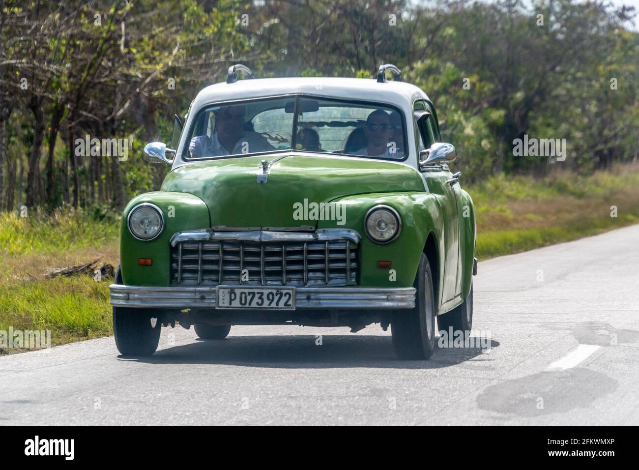 Cuban vintage American cars driving, Cuba transportation scene in the ...