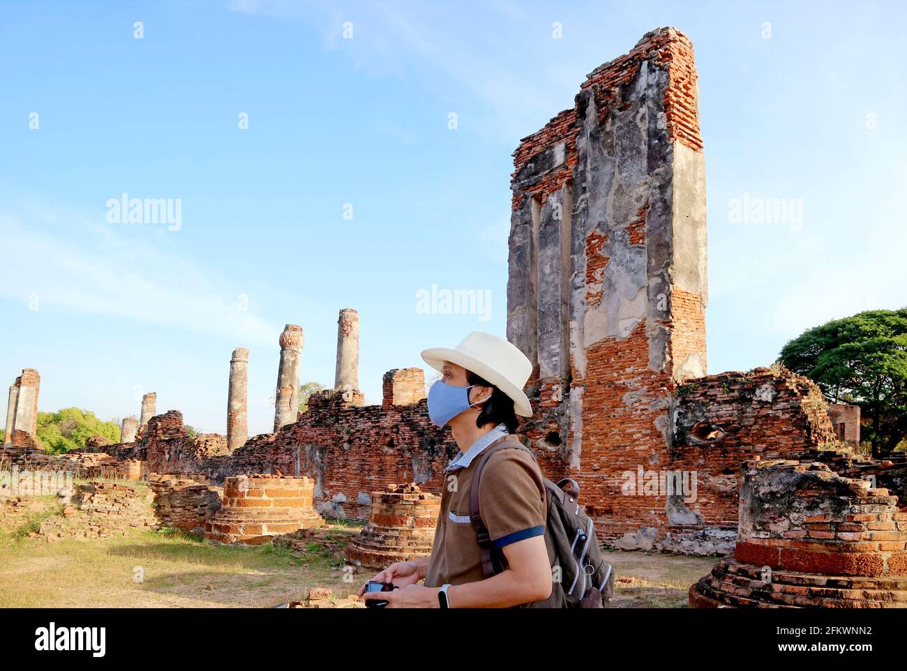 Wearing mask amid new hi-res stock photography and images - Alamy